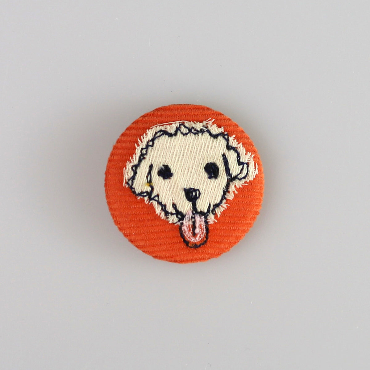 Coco the dog pretty badge by Poppy Treffry